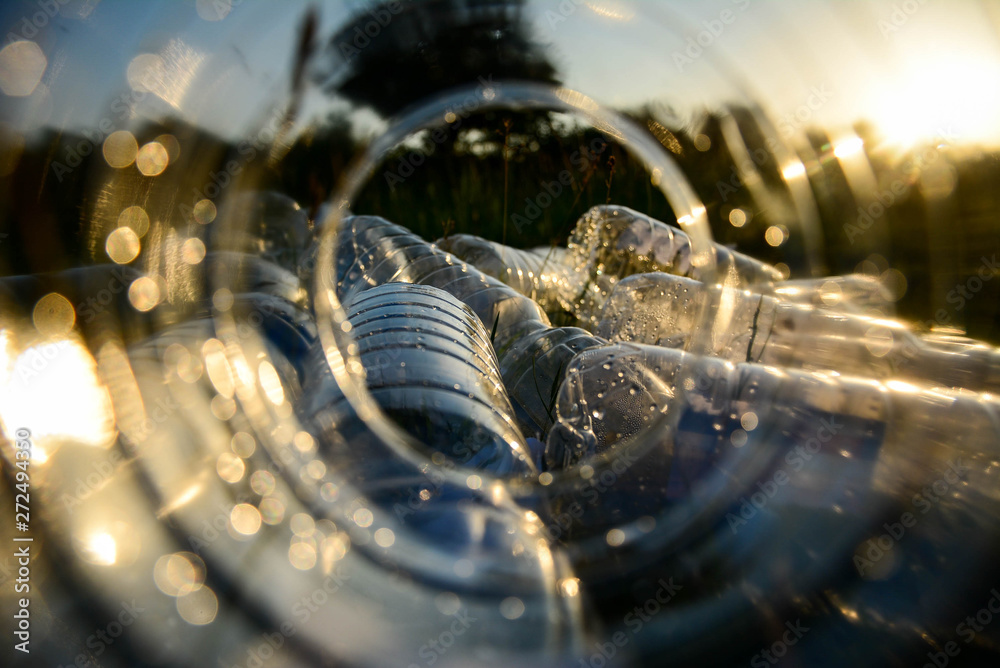 Concept of environmental pollution. Plastic bottles pollute nature and ...