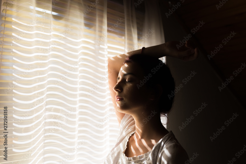 Beautiful portrait on window light Stock Photo | Adobe Stock