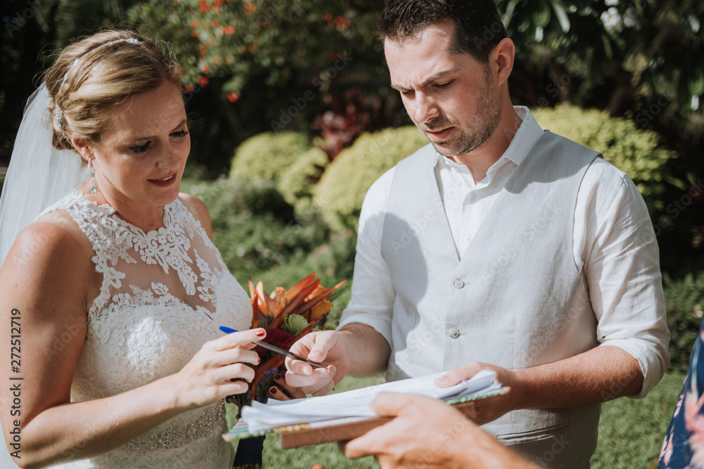 Couple Signing Wedding License Stock Photo | Adobe Stock