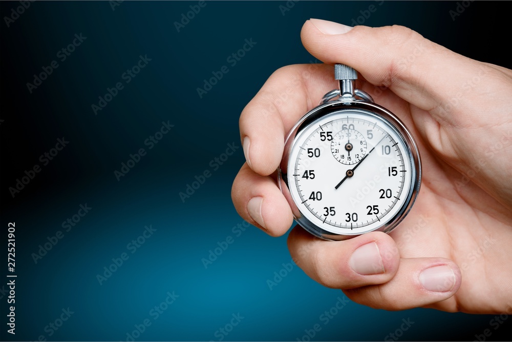 Stopwatch in Human Hand, Timer Stock Photo | Adobe Stock