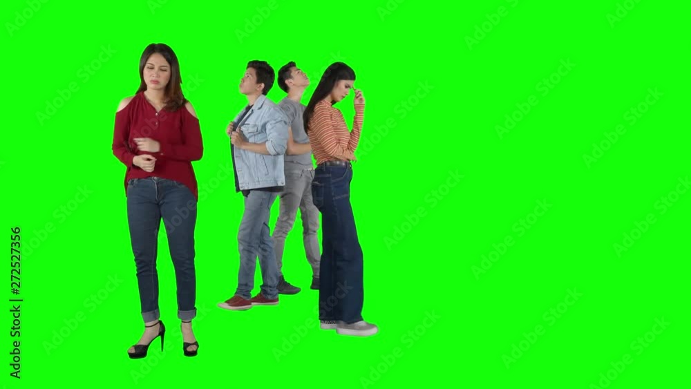 Group of confused young people walking back and forth while thinking in ...