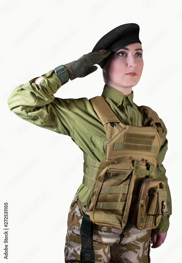 Young beautiful military soldier woman in protective armor tactical ...