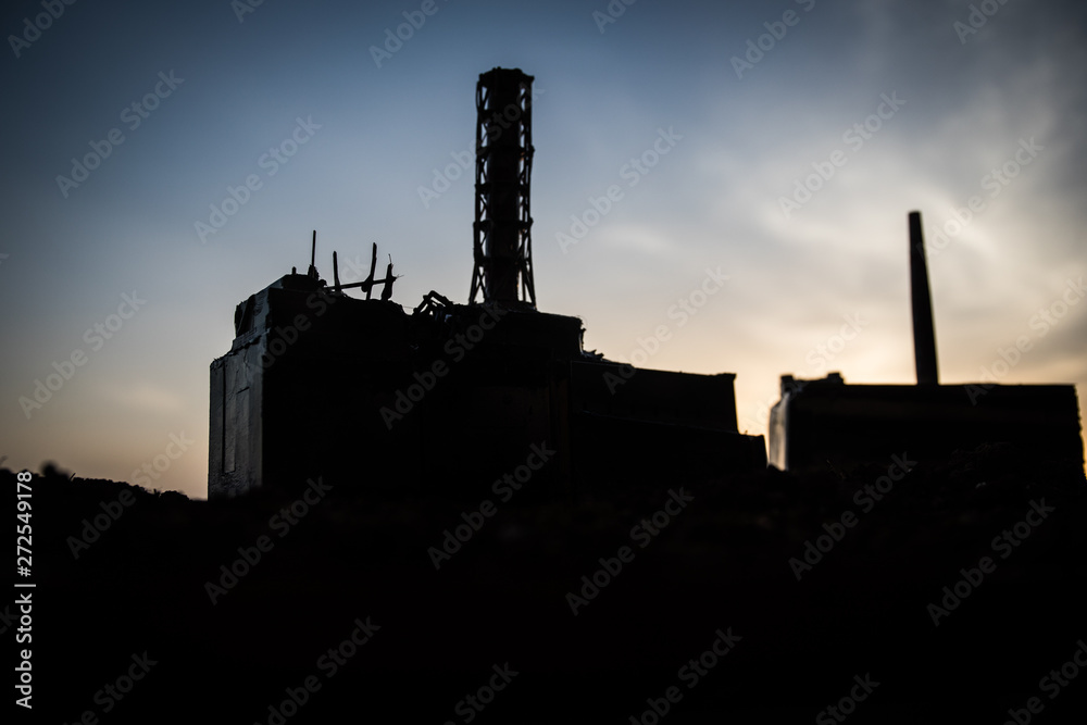 Creative artwork decoration. Chernobyl nuclear power plant at night ...