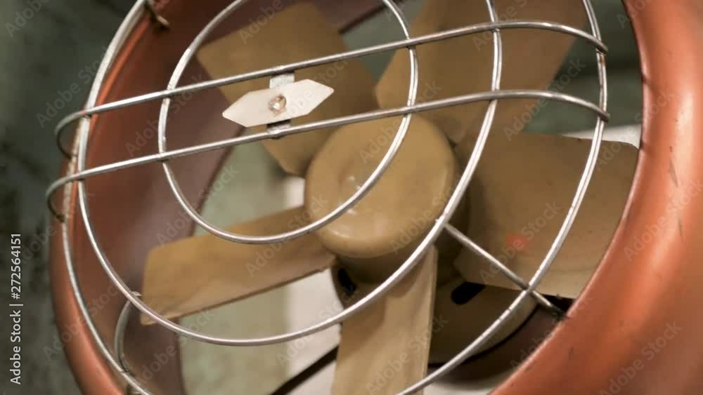 Antique model fan in brown color. In the image you can see the spruce ...