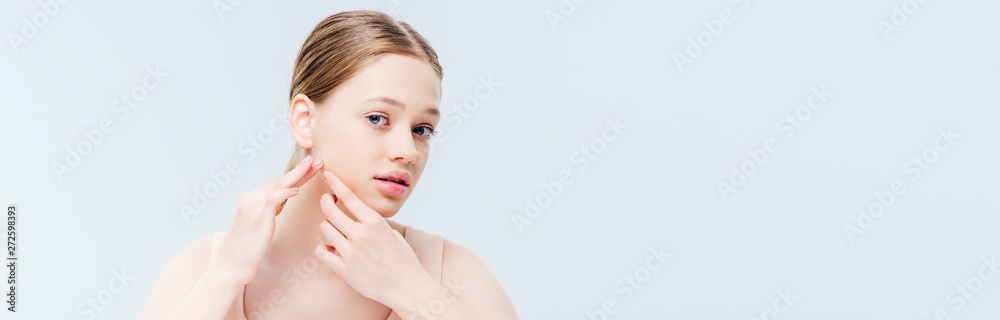 upset teenage girl touching pimple on face, panoramic shot Stock Photo ...