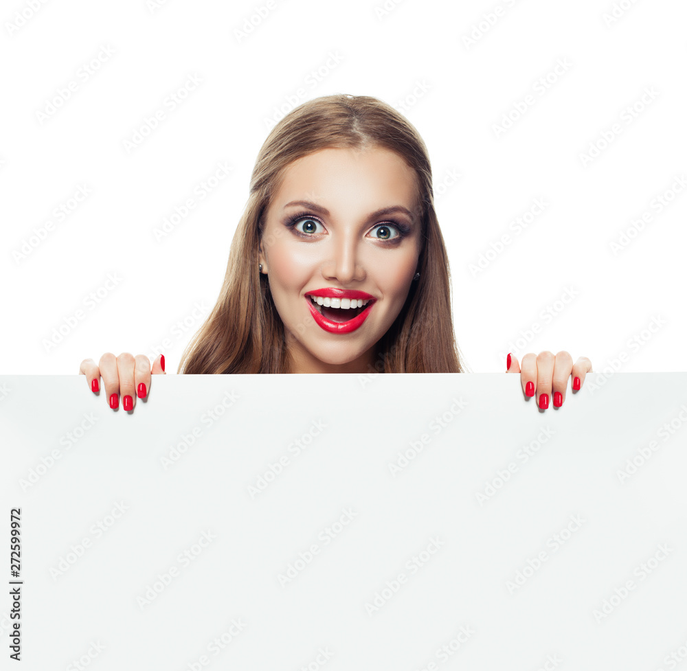 Beautiful surprised woman and white empty paper board background ...