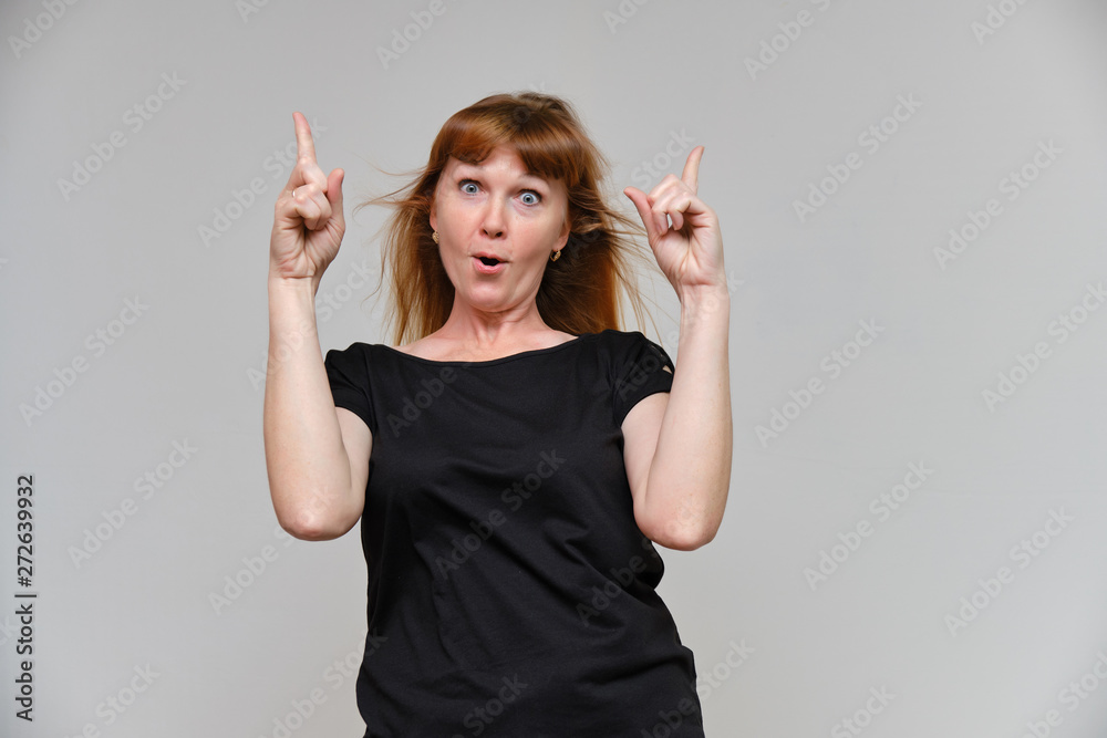 Studio portrait of a beautiful pretty woman aged 40 years on a white ...