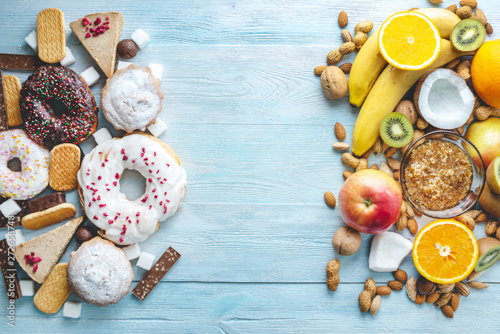 Unhealthy and healthy sweets. Organic and dietary food. Fruits and nuts ...