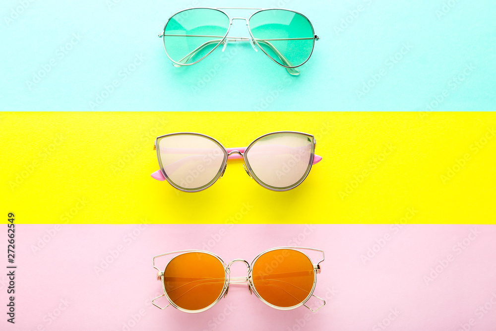 Modern sunglasses on colorful background Stock Photo | Adobe Stock