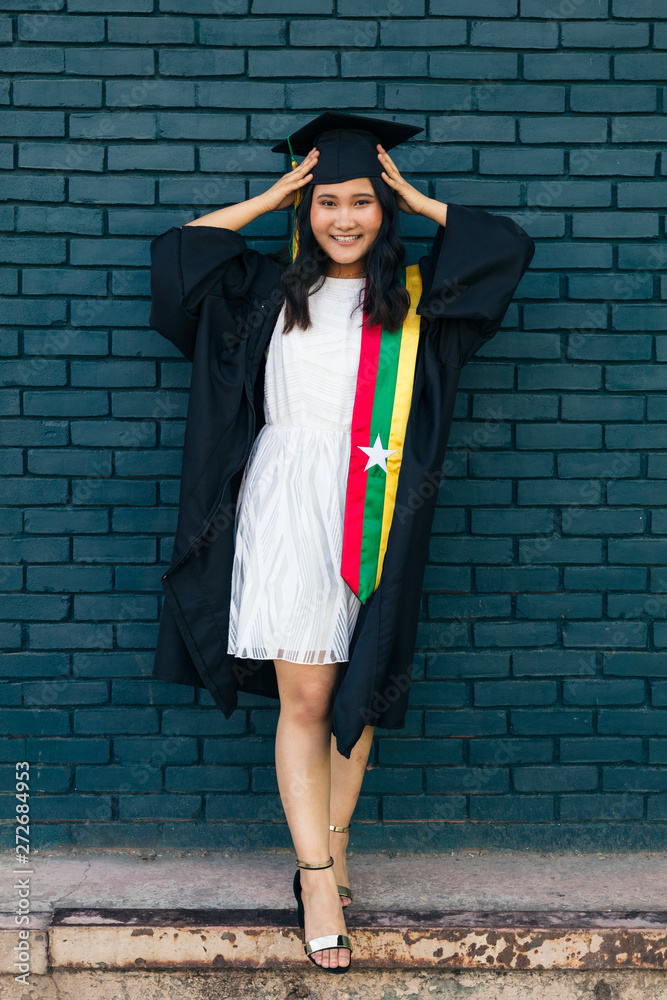 Portrait of girl graduating Stock Photo | Adobe Stock