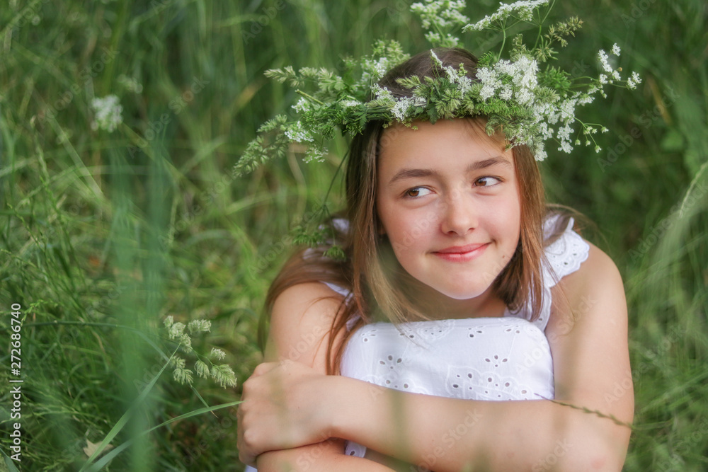Beautiful romantic smiling preteen girl with green and white fresh ...