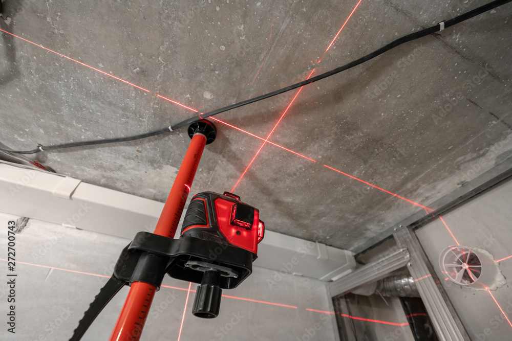 Laser measurement during renovation. Construction tools and equipment ...