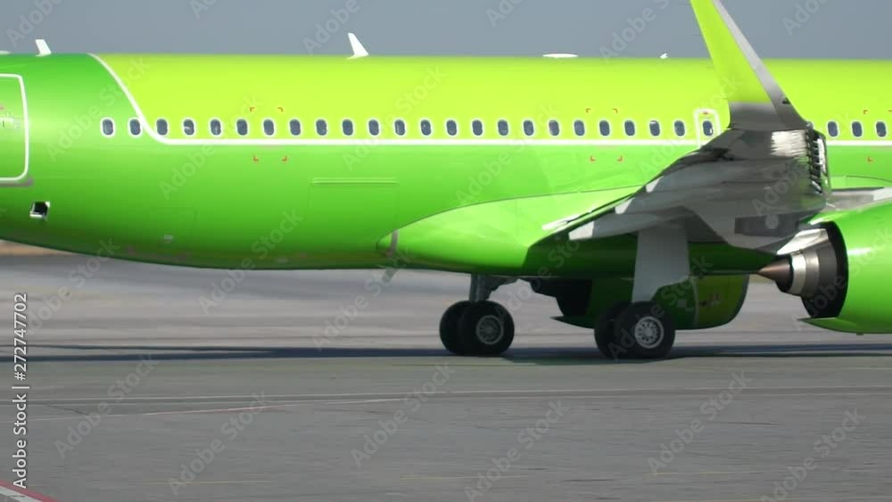 airplane aircraft moving and taxiing along runway at international ...