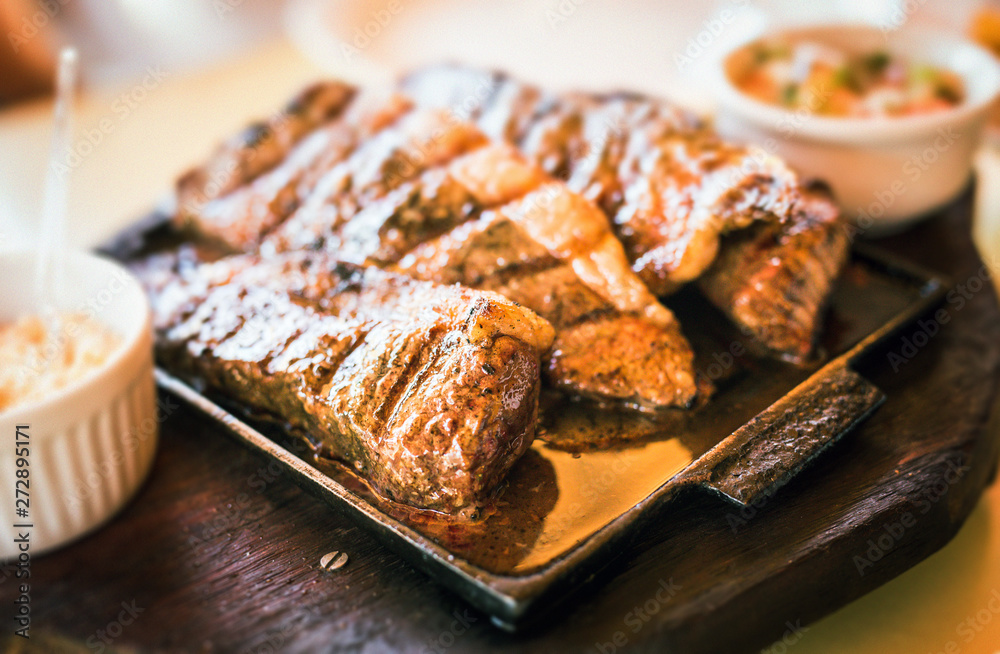 Grilled Picanha, traditional Brazilian beef cut. Meat served on the ...