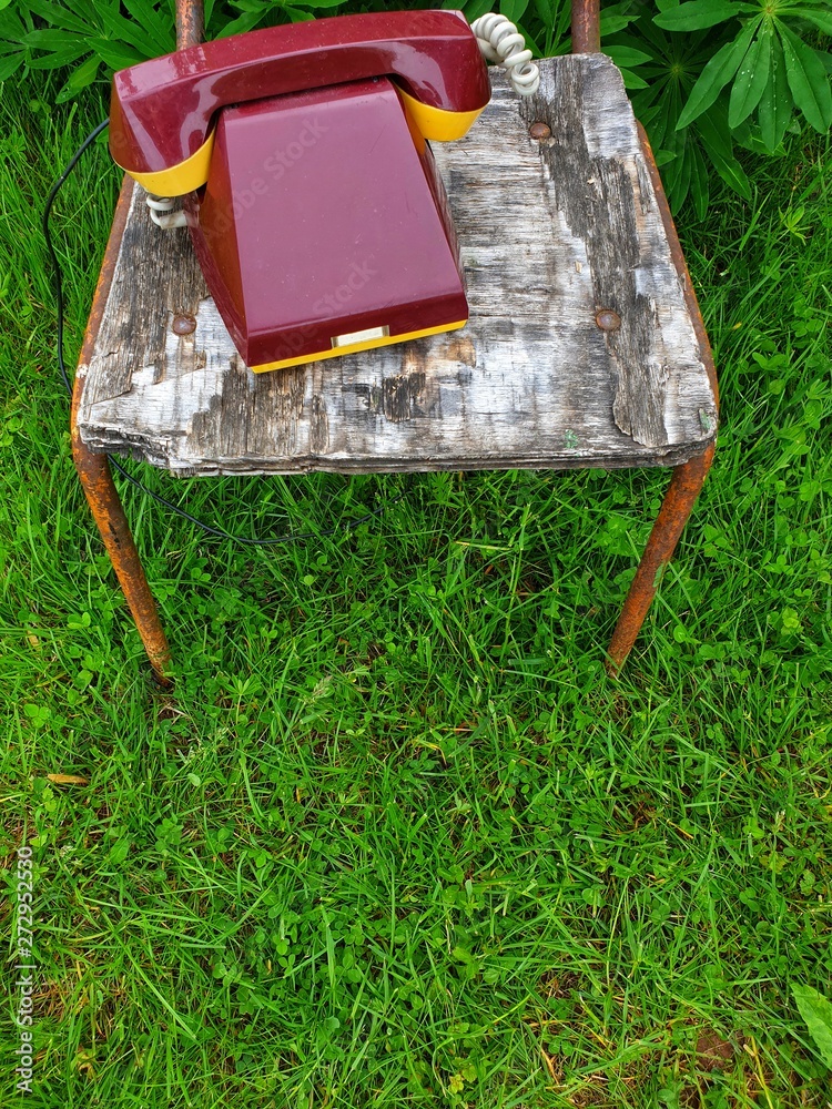 old telephone with speaking tube on the wire, old telephone in nature ...
