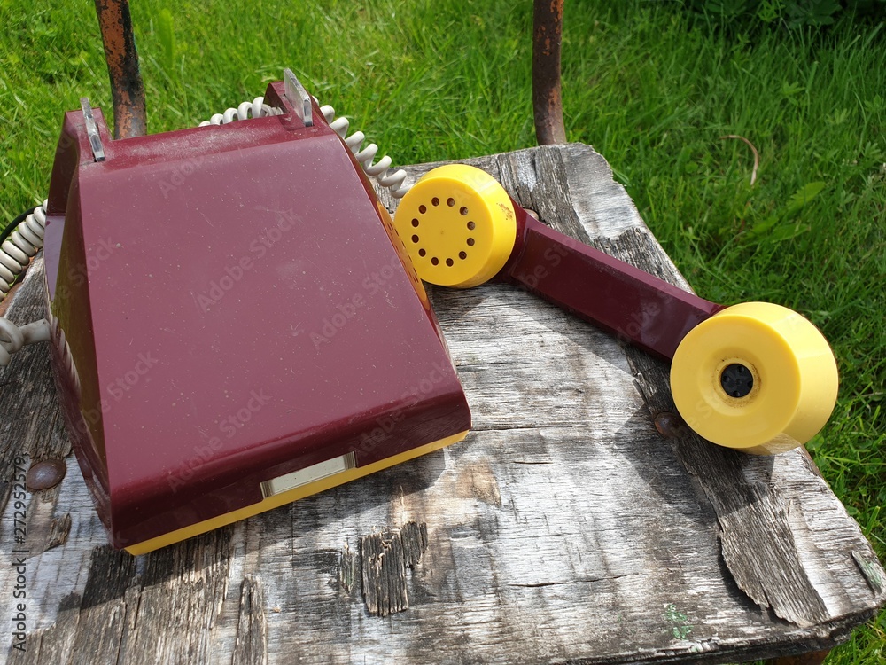 old telephone with speaking tube on the wire, old telephone in nature ...