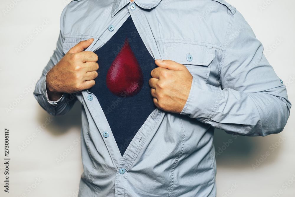 Business man in shirt with a picture red blood drop. World Blood Donor ...