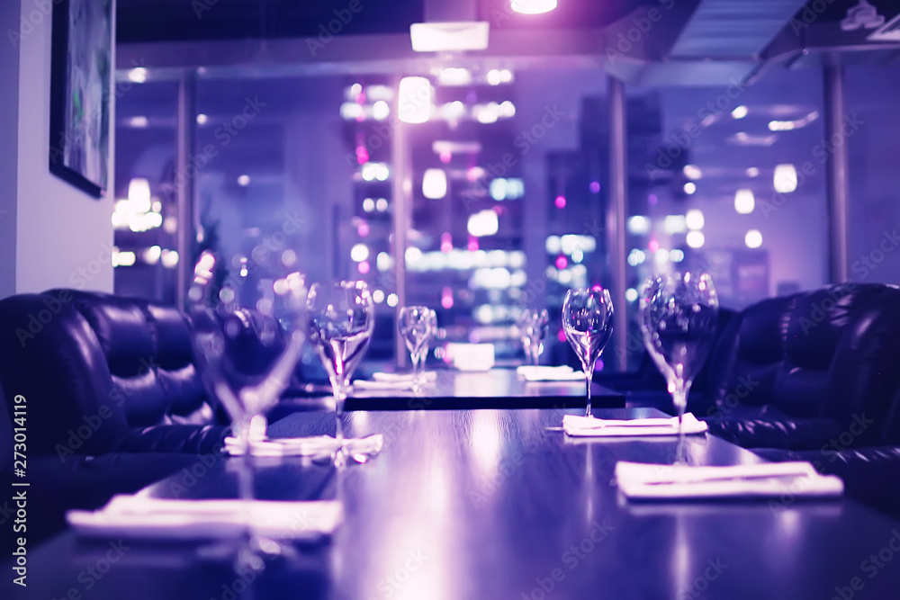 nightclub penthouse in a skyscraper / table setting with glasses and ...