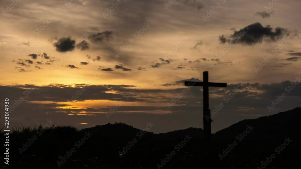Time lapse of Conceptual wood cross or religion symbol shape over a ...