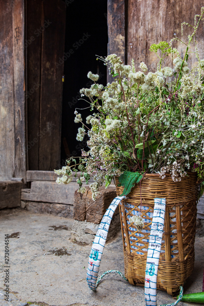 Foto de Hmong traditional basket backpack full of flowers at the ...