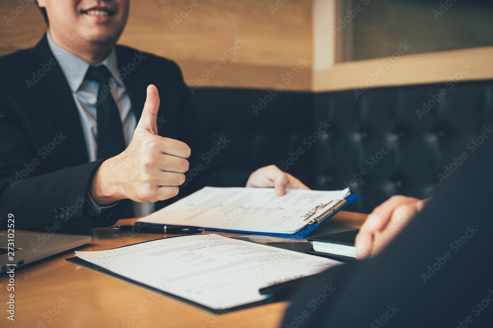 Job interviewer give a thumbs-up for job applications for new employee ...