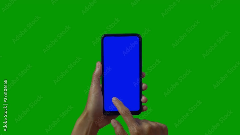 Phone in the hand close up isolated at green background. Phone screen ...