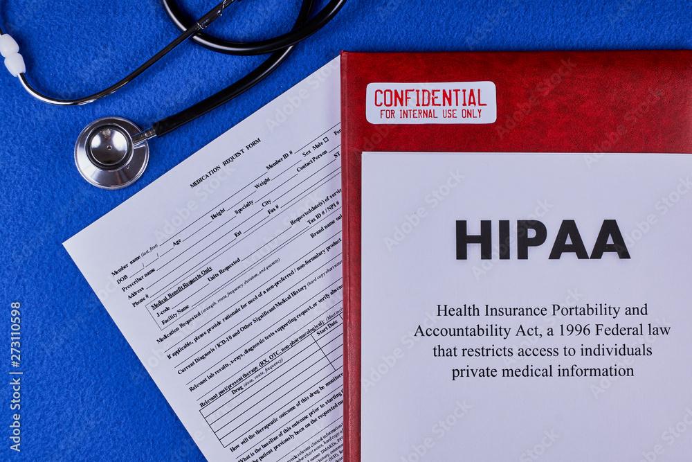 Health Insurance Portability and accountability act HIPAA, red folder ...