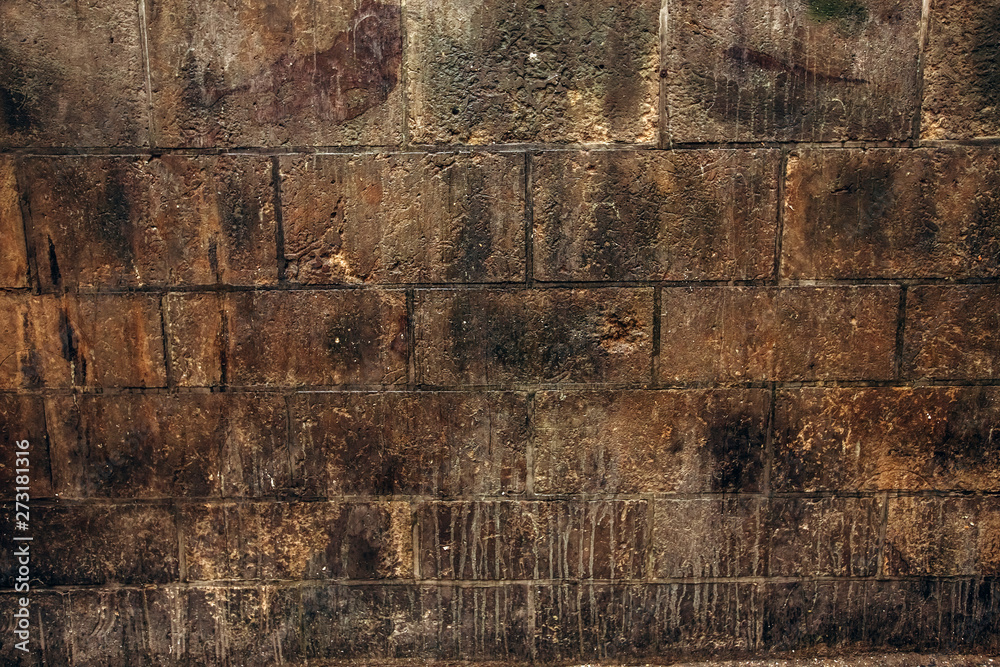 Pavement texture. An old stoneblock pavement cobbled with square ...