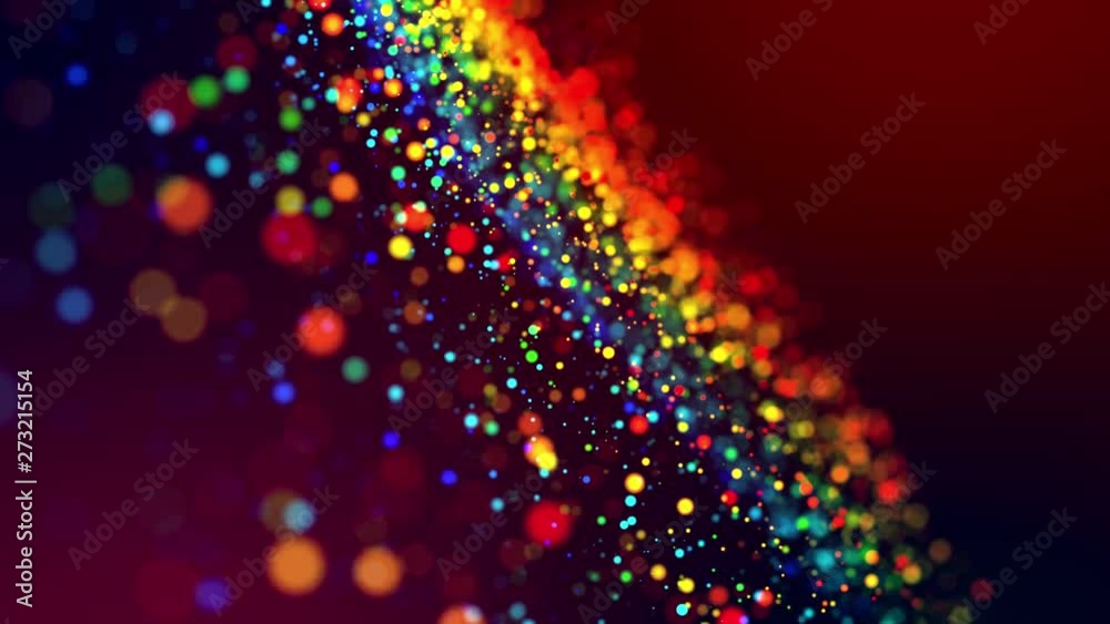 multicolored particles like confetti or spangles float in a viscous ...