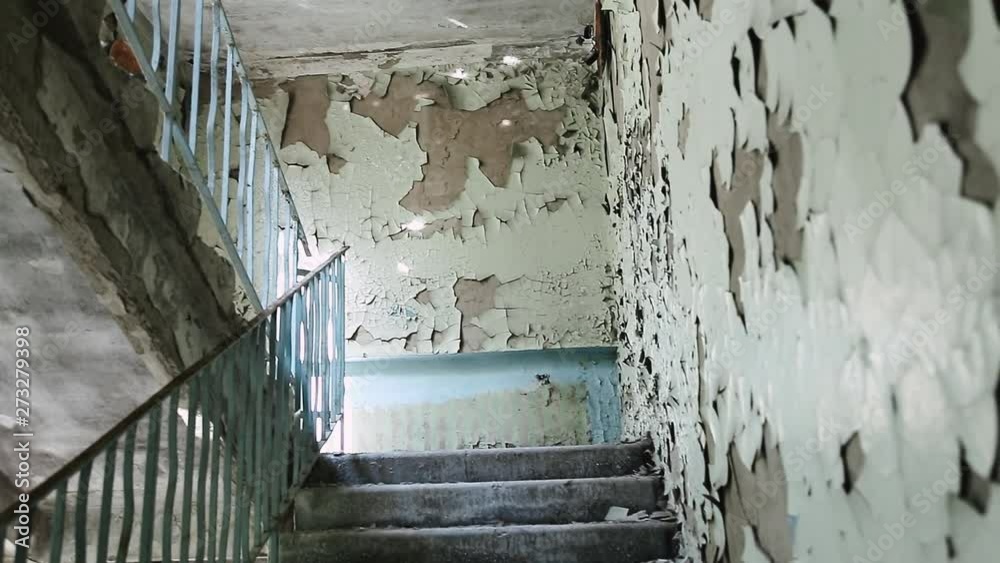 Inside an abandoned building. Almost collapsed and ruined city block ...