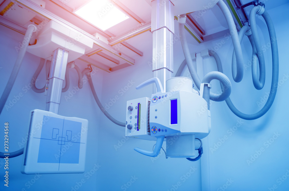 X-ray room in a hospital. Classic ceiling-mounted x-ray system. Stock ...