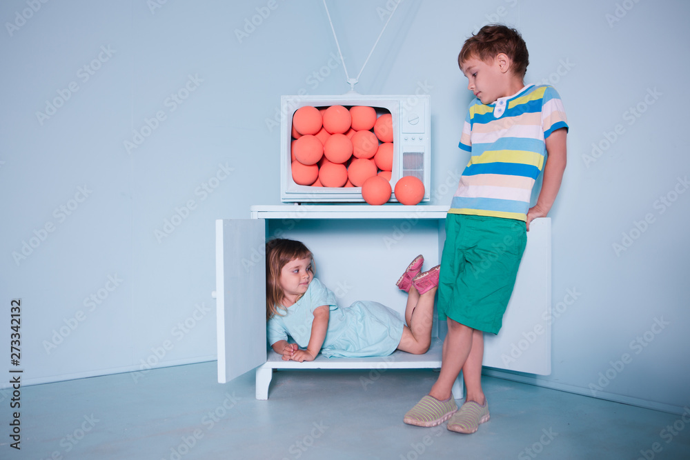 little childrenl with old retro television. Kids, TV concept. Kids ...