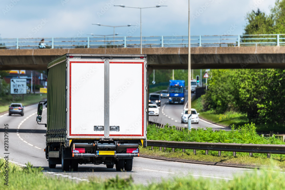 curtain side lorry truck on uk motorway in fast motion Stock Photo ...