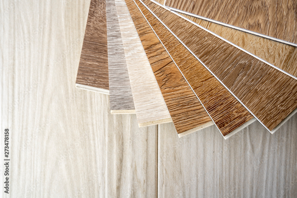 sample stack of clean tone of vinyl wood tile for customer selection ...