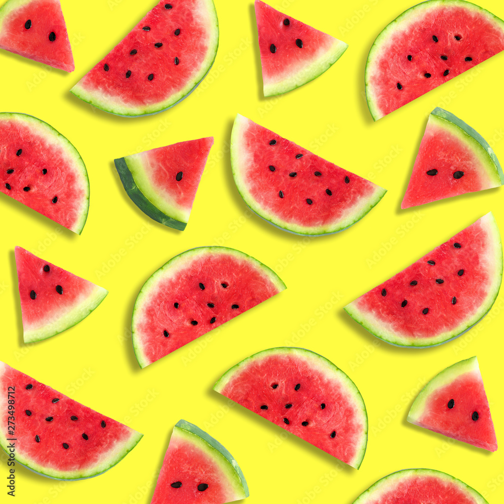 Colorful summer fruit pattern of watermelon slices on a vibrant yellow ...