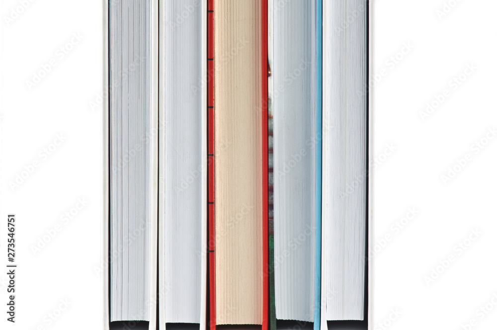 The ends of the books standing vertically on white background Stock ...