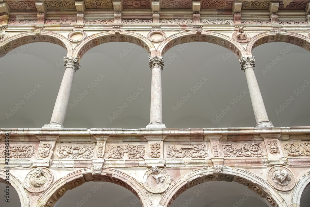 Arcade with columns and bas-reliefs Stock Photo | Adobe Stock