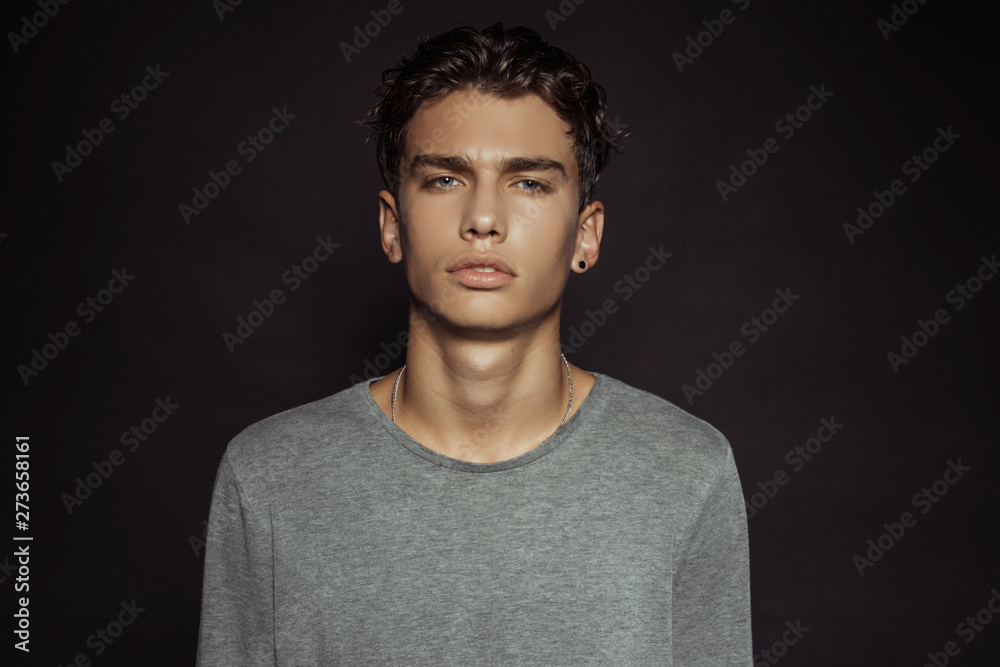 Strong stripped muscle male model in grey underwear and grey jamper and ...