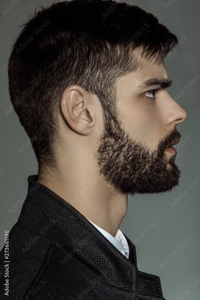 Muscle strong bearded face beautiful stripped male model in formal look ...