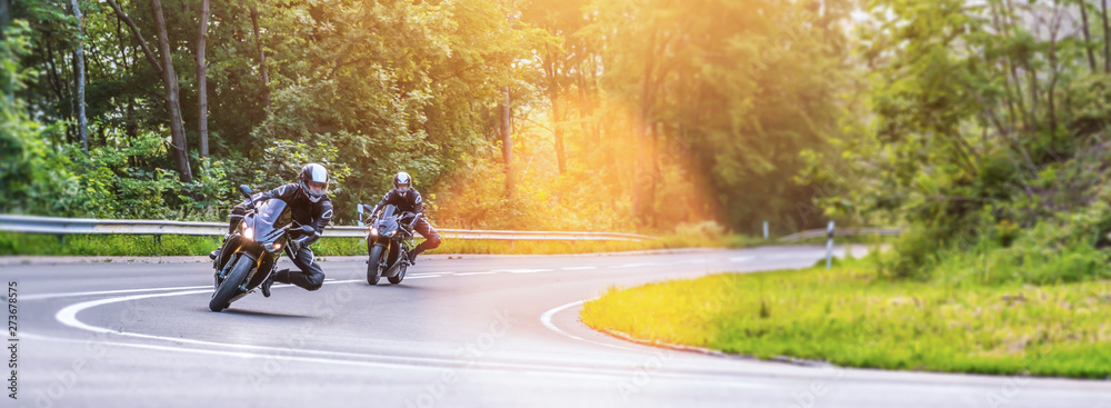 motorbike on the road riding. having fun riding the empty road on a ...