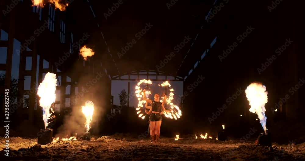 Professional fire show in the old hangar of the aircraft show ...