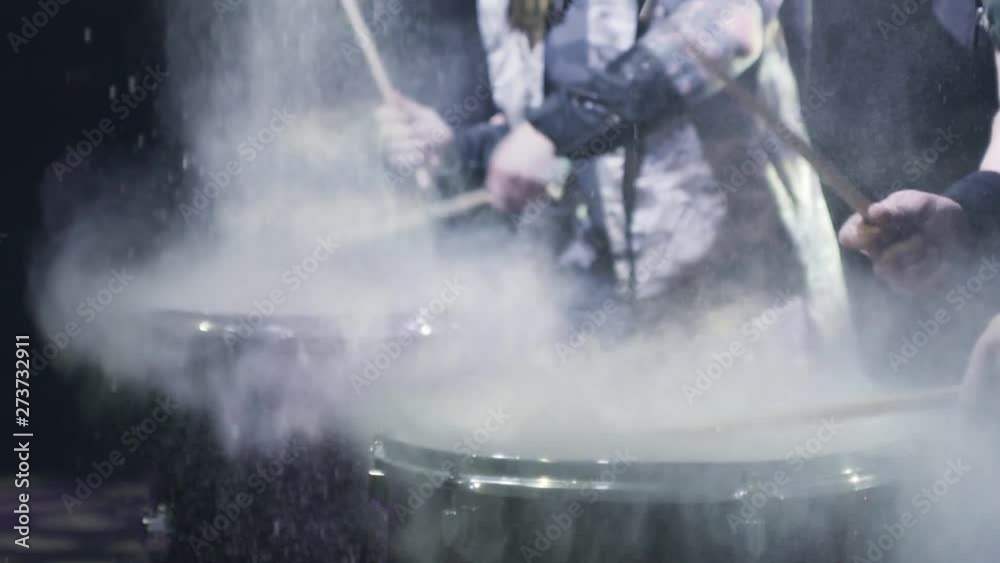 Drummers banging sticks on drums. Action. Close-up of drummers banging ...