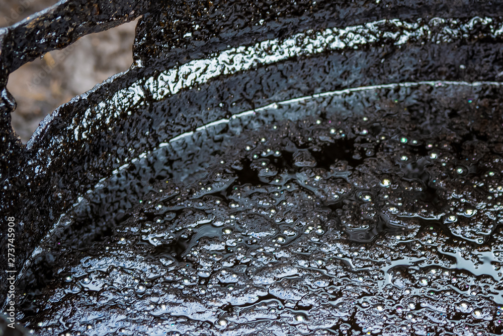 crude oil surface background textured. Pollution with oil products ...