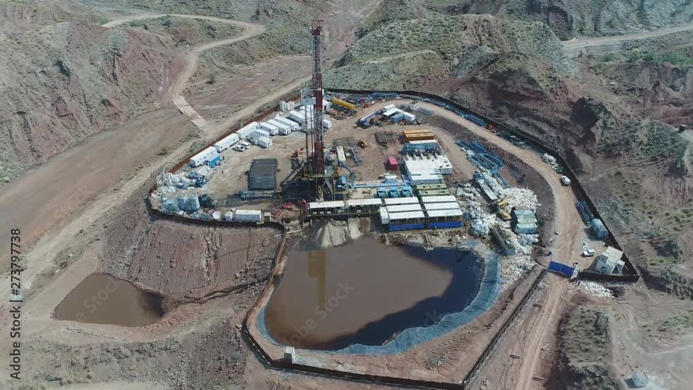 Crude oil drilling well pumping the black gold out of the soil of the ...
