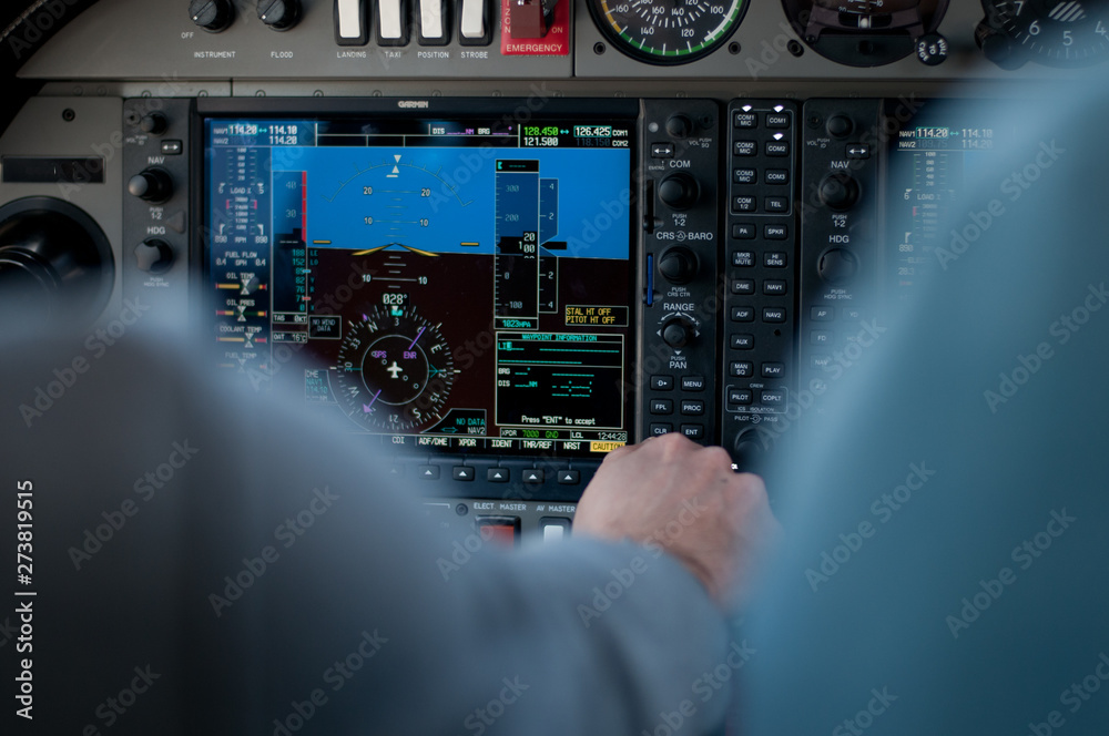 Instruments on a glass cockpit of a small aircraft flying Stock Photo ...