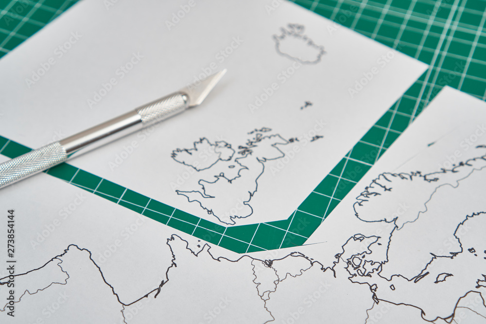 europe map with a ruler and a cutter Stock Photo | Adobe Stock