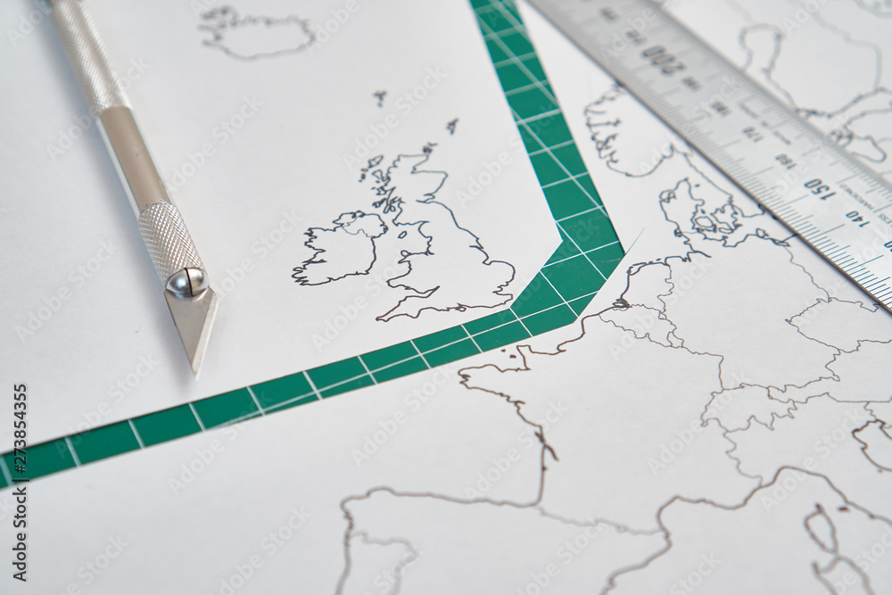 europe map with a ruler and a cutter Stock Photo | Adobe Stock