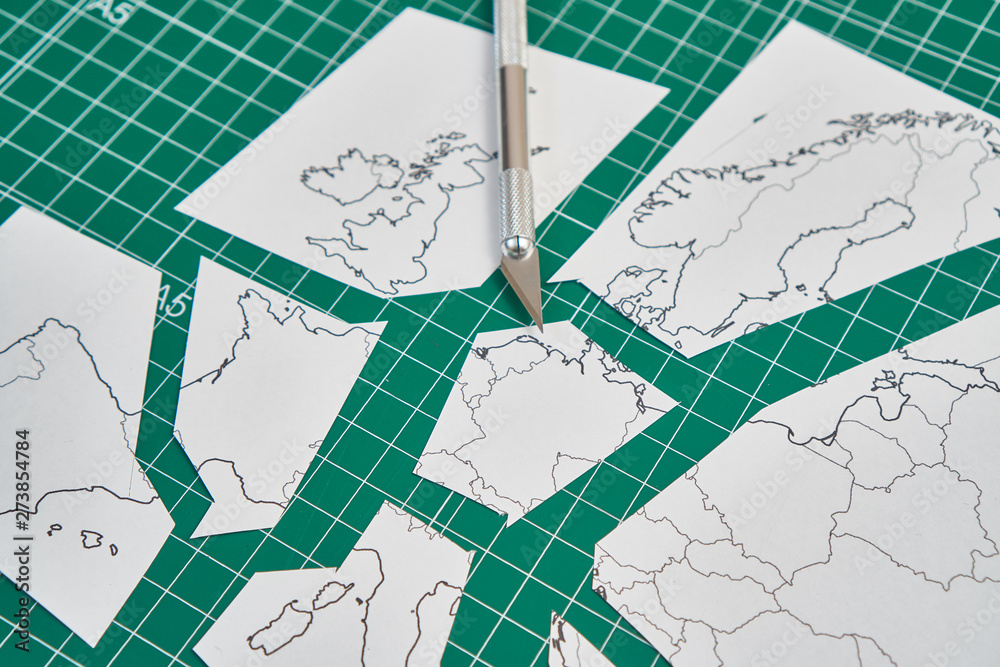 europe map with a ruler and a cutter Stock Photo | Adobe Stock
