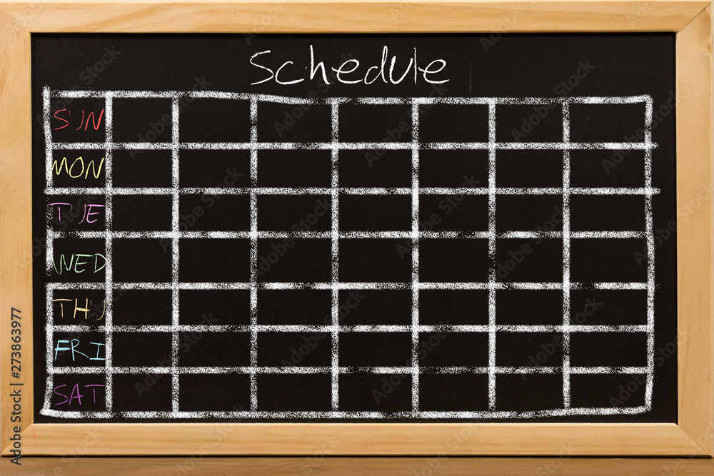 Schedule with grid time table on black chalkboard background Stock ...