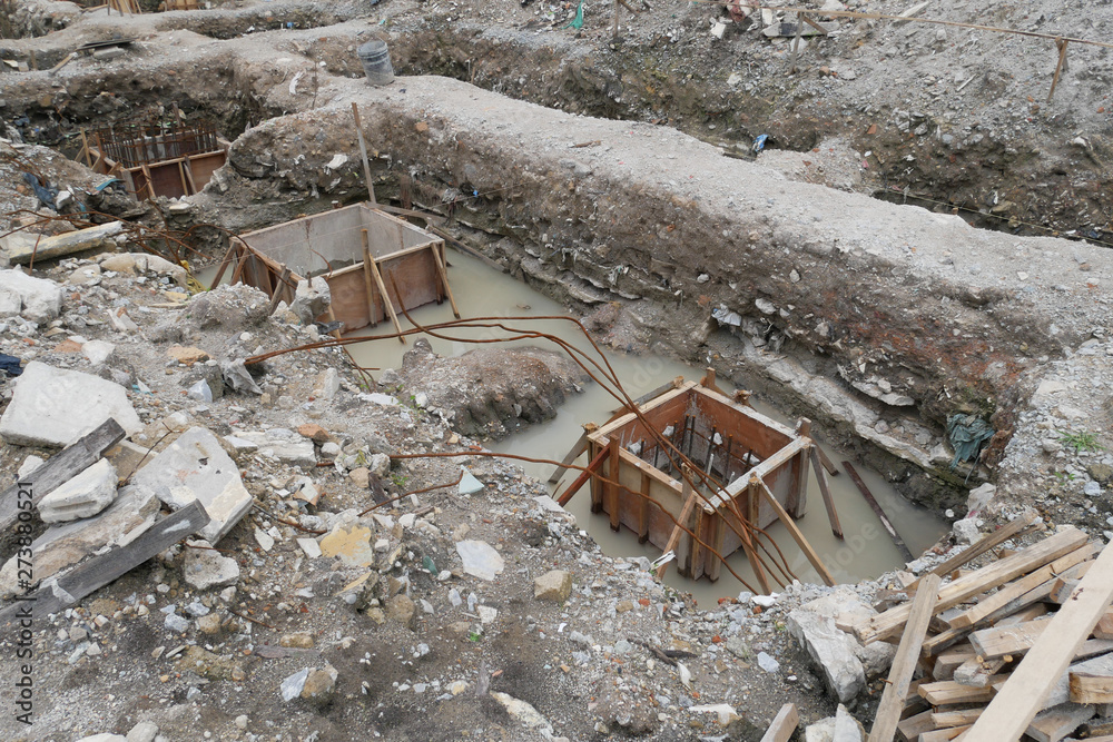 Pile cap and column stump under construction at the construction site ...